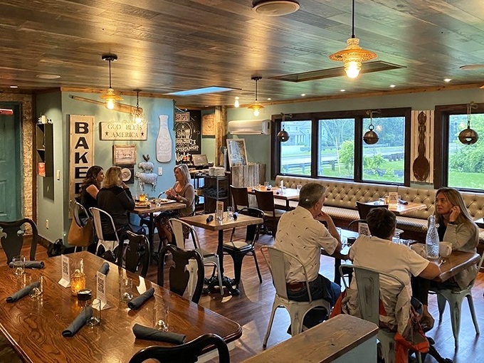 Where rustic meets refined. The wooden ceiling, industrial-chic lighting, and comfortable banquettes create that rare atmosphere where both your jeans and your date night outfit feel perfectly at home.