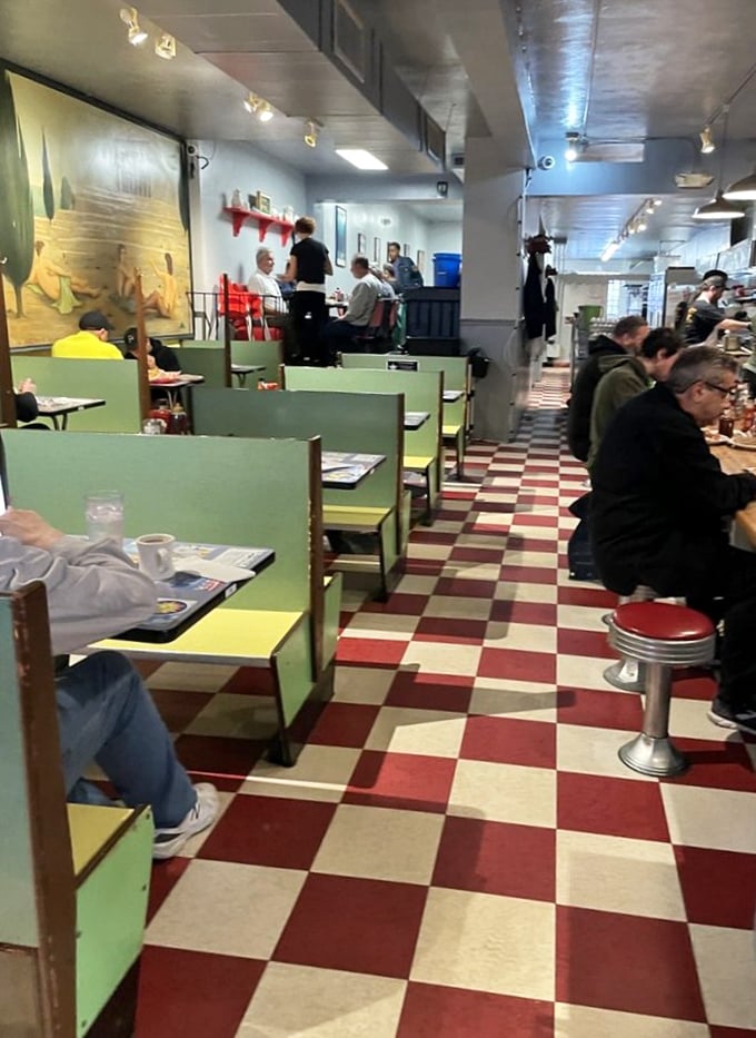 The classic diner interior feels like a time capsule with its checkerboard floor and mint-green booths&mdash;comfort before your comfort food arrives.