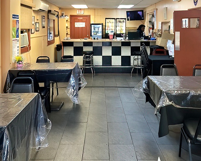 Inside Nikki's Place, the checkered counter and no-frills dining room tell you exactly what matters here: the food, not the furniture.