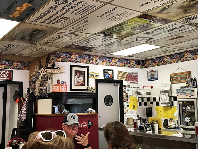 Step inside and the ceiling tells stories &ndash; literally. Years of signatures and mementos create a living guestbook above diners' heads.