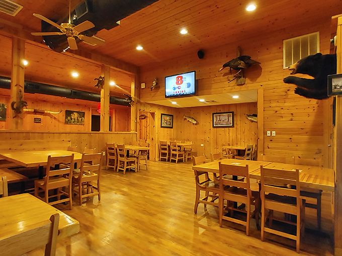 Pine-paneled perfection where every wooden beam tells a story. The dining room feels like the world's coziest cabin—if cabins served life-changing steaks.