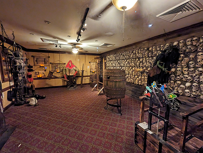 Wall-to-wall skulls create an ambiance that screams "cozy dinner party from hell." The perfect backdrop for contemplating how good we have it in modern times.