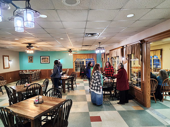 Inside, the checkerboard floor and wooden chairs aren't trying to impress anyone&mdash;they're just setting the stage for the real star: the food.