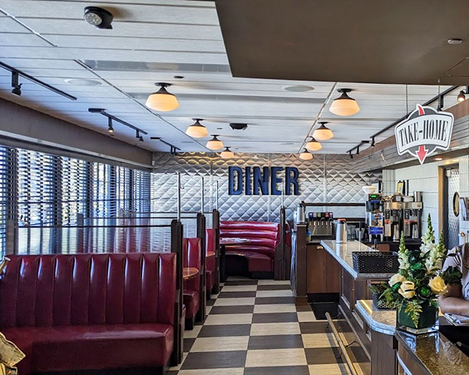 Classic red booths, checkered floors, and that diamond-patterned wall&mdash;this isn't your grandfather's diner, but he'd still feel right at home.