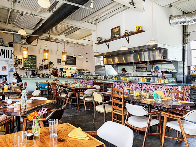 Industrial meets inviting inside Milktooth, where the open kitchen theater and eclectic furnishings set the stage for brunch brilliance.