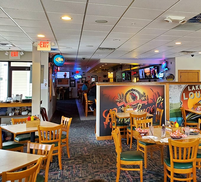 Wooden chairs, green cushions, and sports memorabilia create that perfect "everybody knows your name" vibe that makes Wisconsin taverns special.
