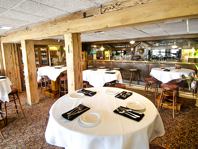 Rustic wooden beams and crisp white tablecloths create that perfect "special occasion that doesn't require a tie" atmosphere. The kind of place where memories are made between bites.