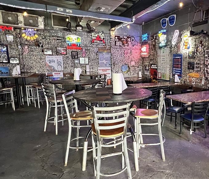 Dollar bills and fishing memorabilia wallpaper the interior, creating the kind of authentic atmosphere money can't buy but stories can build.