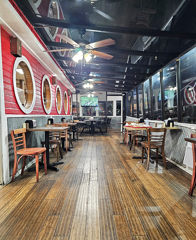 Rustic charm meets practical comfort. Those porthole windows and wooden floors have witnessed countless barbecue epiphanies over the years.