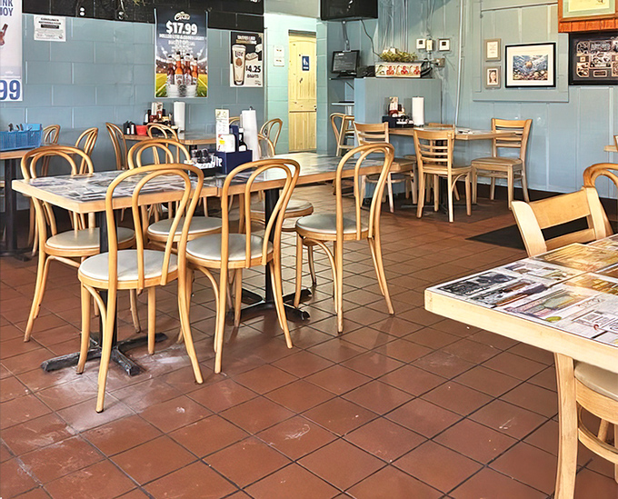 The turquoise walls and simple wooden tables create the perfect "no shoes, no problem" dining atmosphere.