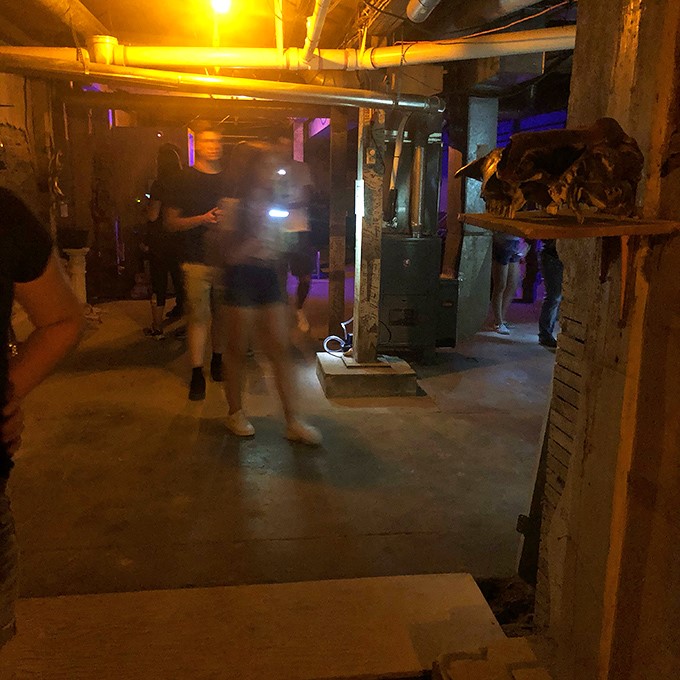 Dimly lit corridors create the perfect backdrop for ghostly encounters. That blur in the photo? Just a visitor... or something else entirely?