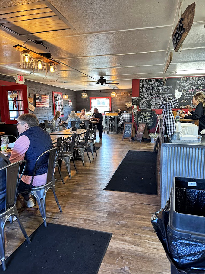 Inside, the rustic charm hits you like a warm hug &ndash; wooden walls, metal chairs, and that magnificent chalkboard menu promising smoky treasures to come.