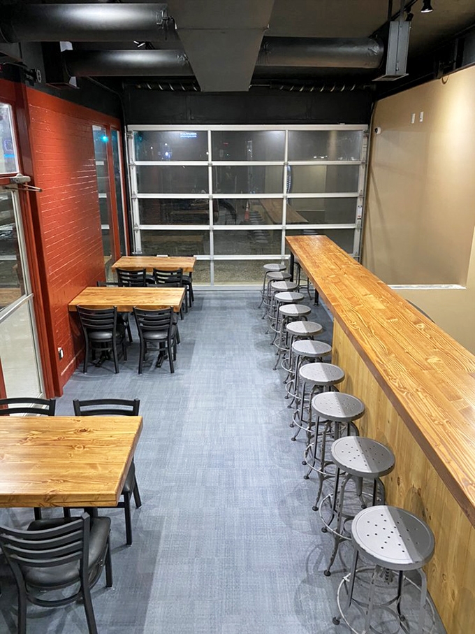 Industrial-chic meets comfort in this no-nonsense interior where the only thing more straightforward than the decor is the commitment to proper barbecue.