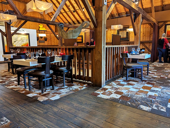 Those exposed beams and patchwork floors create the kind of ambiance that makes every meal feel like a special occasion.