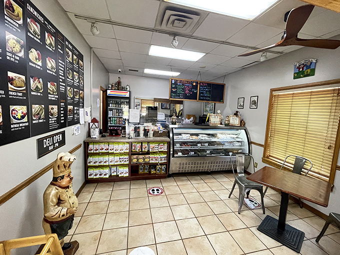That little baker statue stands guard like a sentinel of quality, silently judging anyone who dares leave without sampling at least one German delicacy.