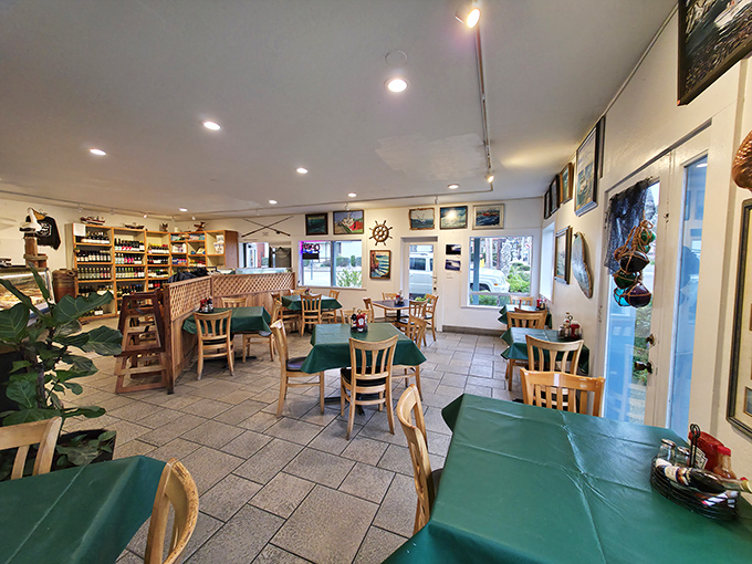 Simple wooden tables, green tablecloths, and nautical decor create the perfect backdrop for seafood that needs no fancy setting to shine. This is where locals come when they want the real deal. 