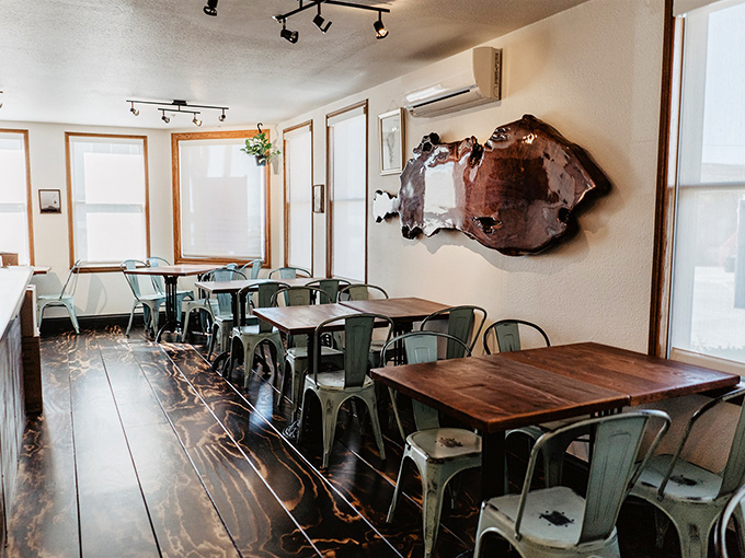 Simple, functional interior with wooden tables and metal chairs&mdash;because when the food is this good, who needs fancy furniture?