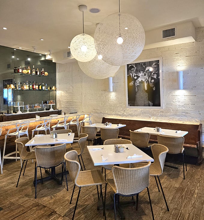 Modern meets cozy in Briarpatch's interior, where textured globe lights hover like culinary moons over conversations waiting to happen.