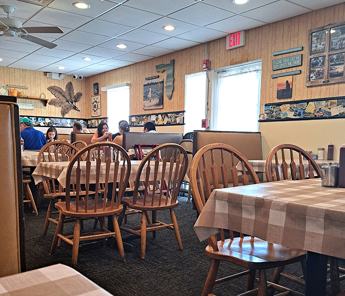 Windsor-back chairs and checkered tablecloths create the perfect backdrop for food that doesn't need Instagram filters—just an elastic waistband.