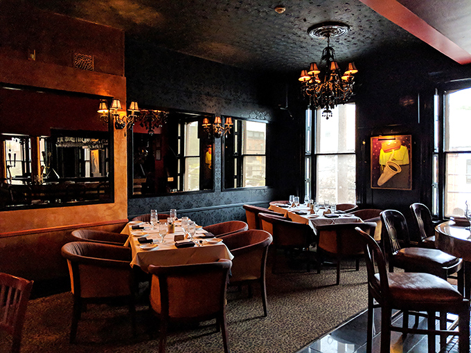 Dark woods, plush seating, and ambient lighting create the kind of atmosphere where you'll want to linger long after dessert arrives.