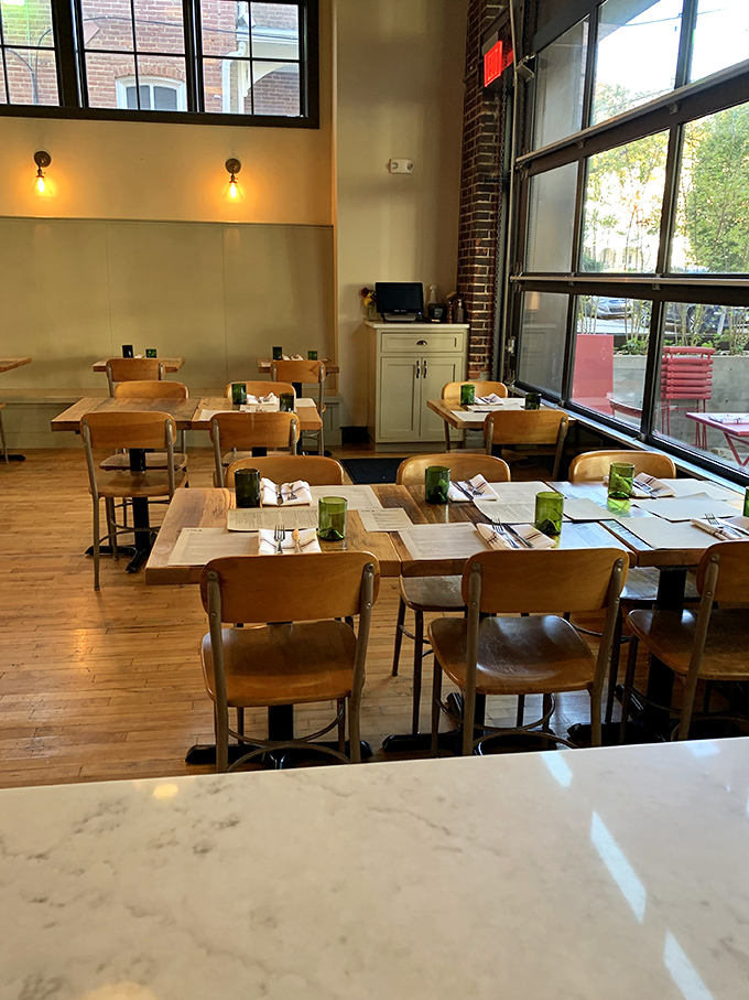 Wooden tables bathed in natural light create a dining space that's both sophisticated and unpretentious&mdash;the culinary equivalent of smart-casual attire.