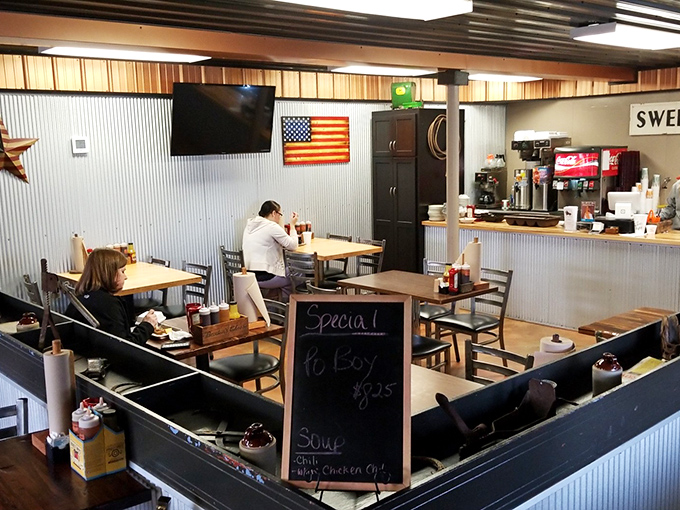 Inside, corrugated metal walls and an American flag create the perfect backdrop for BBQ pilgrims seeking smoky salvation.