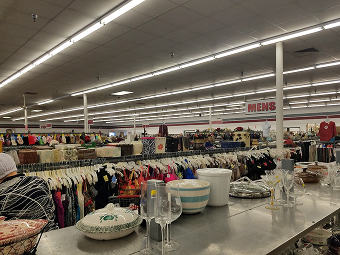 Endless racks stretching toward the fluorescent horizon. This isn't shopping &ndash; it's an expedition into the wilderness of secondhand wonders. 