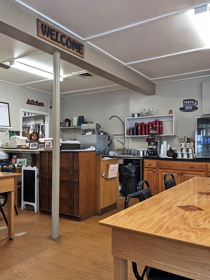 The "WELCOME" sign isn't trying to be ironic&mdash;it's genuinely welcoming you to a world where fresh coffee flows and conversation matters.