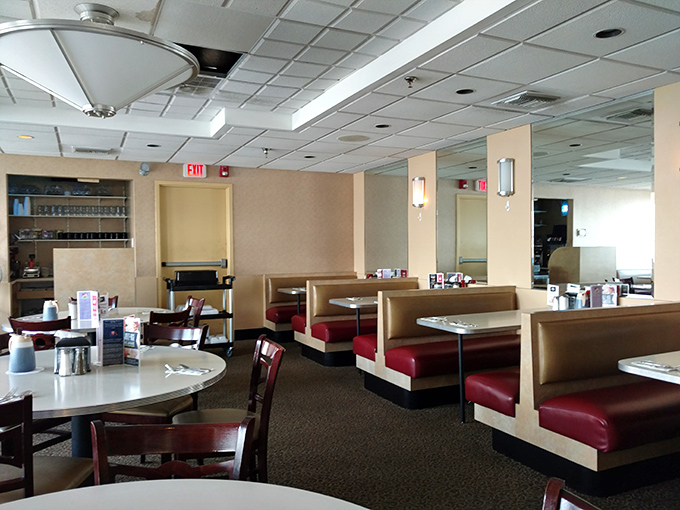 Classic burgundy booths invite you to slide in and stay awhile. This isn't trendy dining&mdash;it's timeless comfort in booth form.