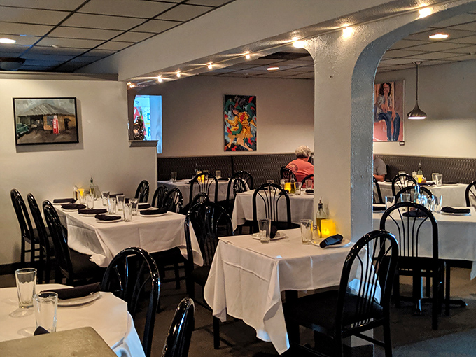 Those wooden chairs have heard decades of "mmms" and "ahhhs" while the white tablecloths whisper, "Yes, this meal matters."