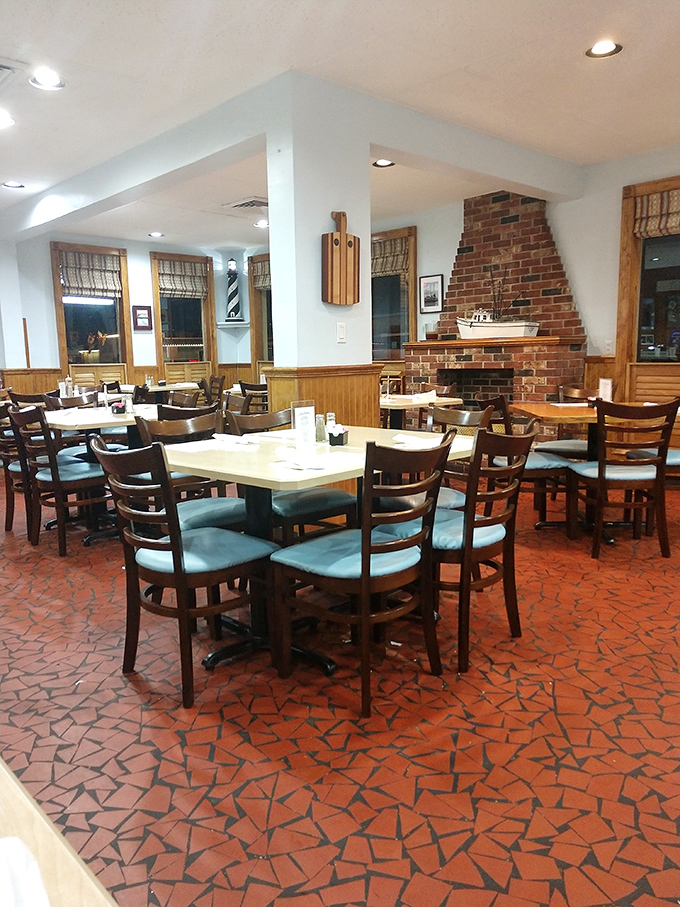 No designer lighting or fancy fixtures here&mdash;just honest wood paneling, a brick fireplace, and tables that have hosted countless seafood celebrations.