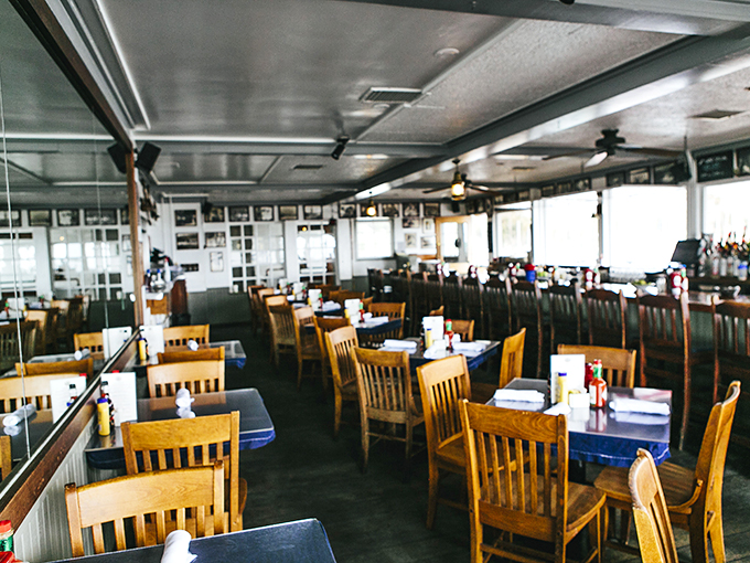 Wooden chairs await their next seafood enthusiasts in this nautical haven. The navy tablecloths aren't trying to be fancy&mdash;they're too busy supporting culinary masterpieces.