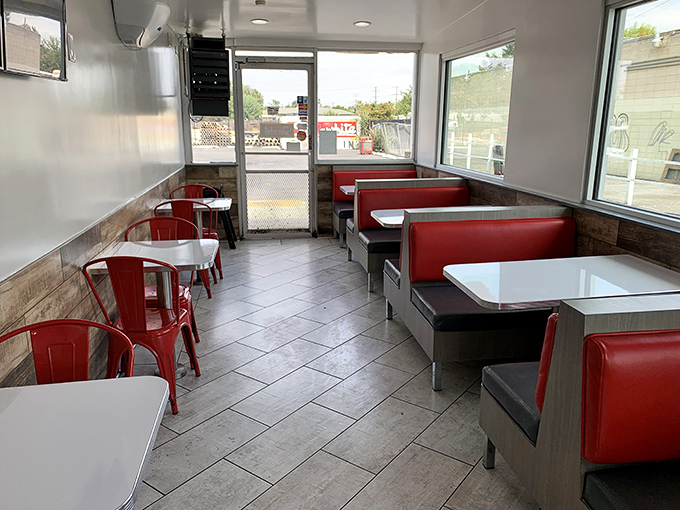 Red vinyl booths and clean simplicity&mdash;this isn't interior design following trends; it's the timeless formula for American dining perfection.