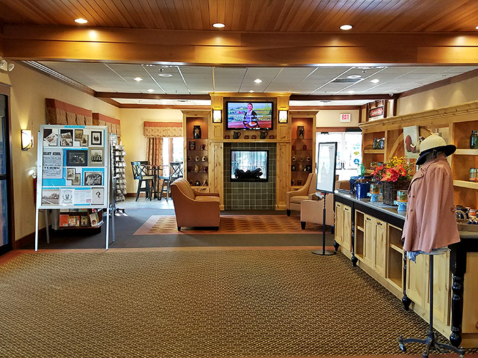 Step inside to a warm embrace of wood-paneled coziness, where the fireplace and comfortable seating invite you to linger long after your meal concludes.