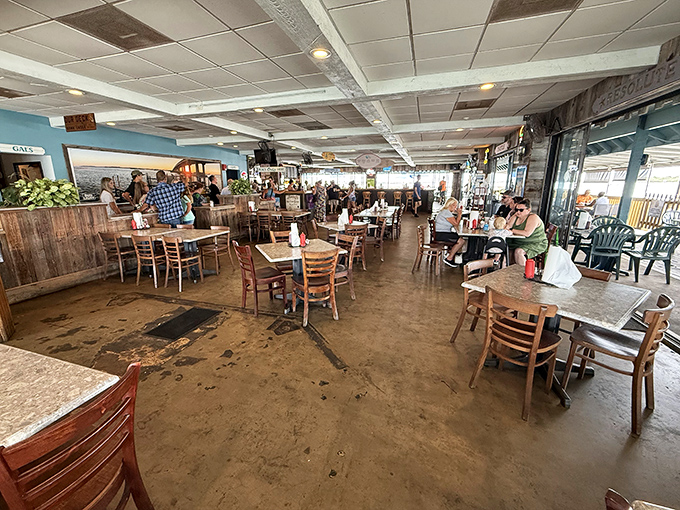 No white tablecloths here, just honest wooden tables, concrete floors, and the promise of seafood that needs no fancy setting.
