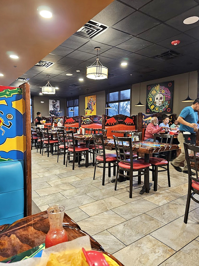 El Toril's vibrant interior blends colorful Mexican artwork with comfortable seating, creating the perfect backdrop for serious burrito business.