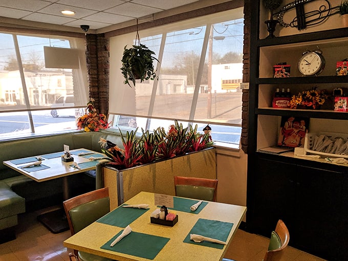 Inside, no fancy interior designer has ever set foot&mdash;and that's precisely the charm. Red checkered tablecloths and honest signage promise only what matters: great food.