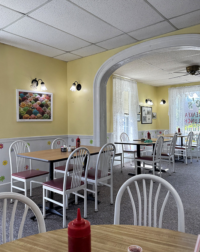Yellow walls and white chairs create the perfect backdrop for serious breakfast conversations and coffee refills.