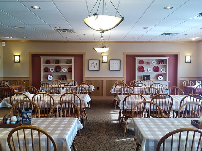 Windsor chairs and checkered tablecloths create that perfect "grandma's dining room" vibe, minus the plastic-covered furniture and awkward family conversations.