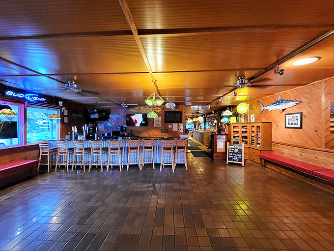 The warm wooden bar area whispers tales of countless celebrations, cold beers, and "remember when we ordered that mountain of crabs?"