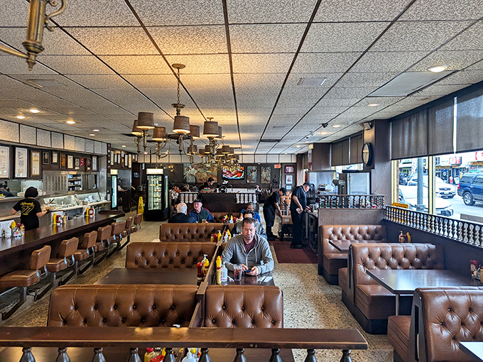The classic interior hasn't changed in decades because perfection doesn't need updating. Those leather booths have cradled countless happy diners.