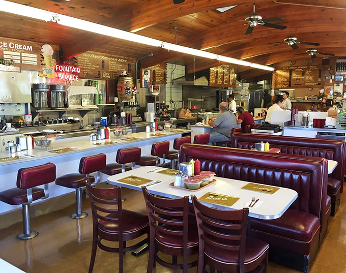 Step inside and the time machine is complete. Red vinyl booths, wood-paneled walls, and counter seating create the diner of your nostalgic dreams.