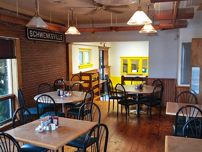 Wooden floors, exposed brick, and that "Schwenksville" sign&mdash;this isn't interior design, it's breakfast authenticity. No filters needed.