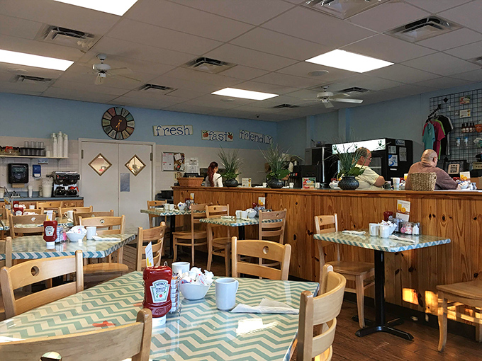 The turquoise walls whisper "relax" while the packed dining room shouts "this place knows what it's doing."