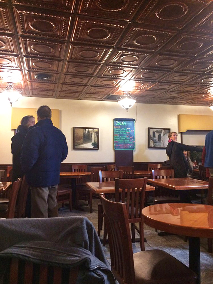 That ornate tin ceiling isn't just gorgeous d&eacute;cor&mdash;it's collecting the satisfied sighs of diners who've just tasted their first spoonful of cream of crab soup.