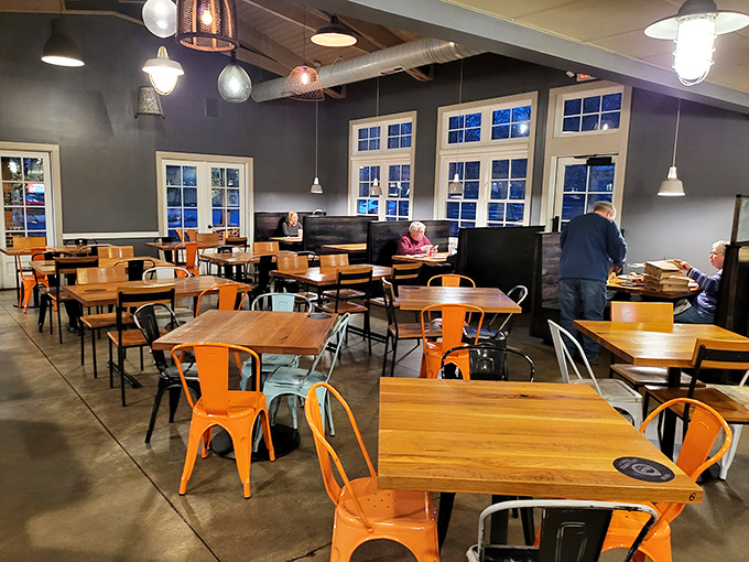Industrial-chic meets farmhouse comfort in this dining room where every table feels like the best seat in the house.