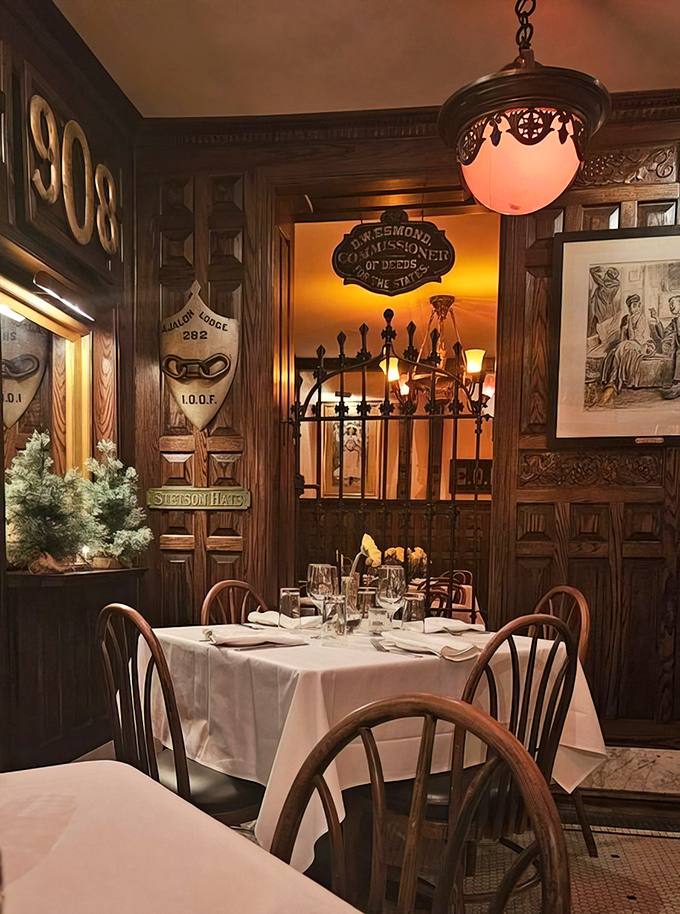 Victorian-era wood paneling, vintage lighting, and white tablecloths create a dining sanctuary where time slows down and conversations deepen over exceptional meals.