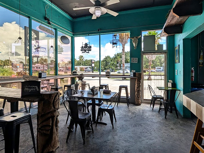 Step inside to a wash of turquoise walls that feel like diving into the nearby Atlantic. The industrial-chic seating says "stay awhile" without trying too hard.