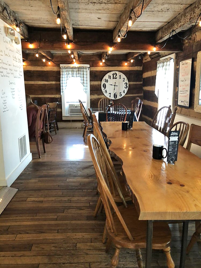 Step inside to discover hand-hewn log walls and string lights that transform a simple meal into a magical Amish Country experience.