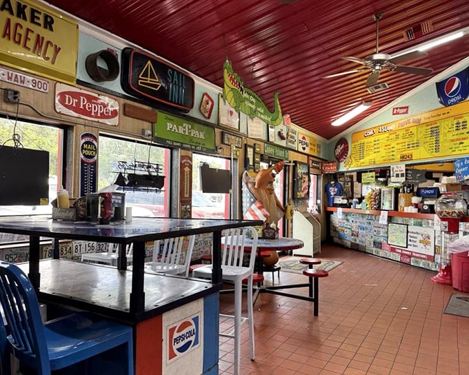 Step inside and you're transported to a simpler time &ndash; vintage signs, red ceiling, and picnic tables create the perfect backdrop for hot dog bliss.